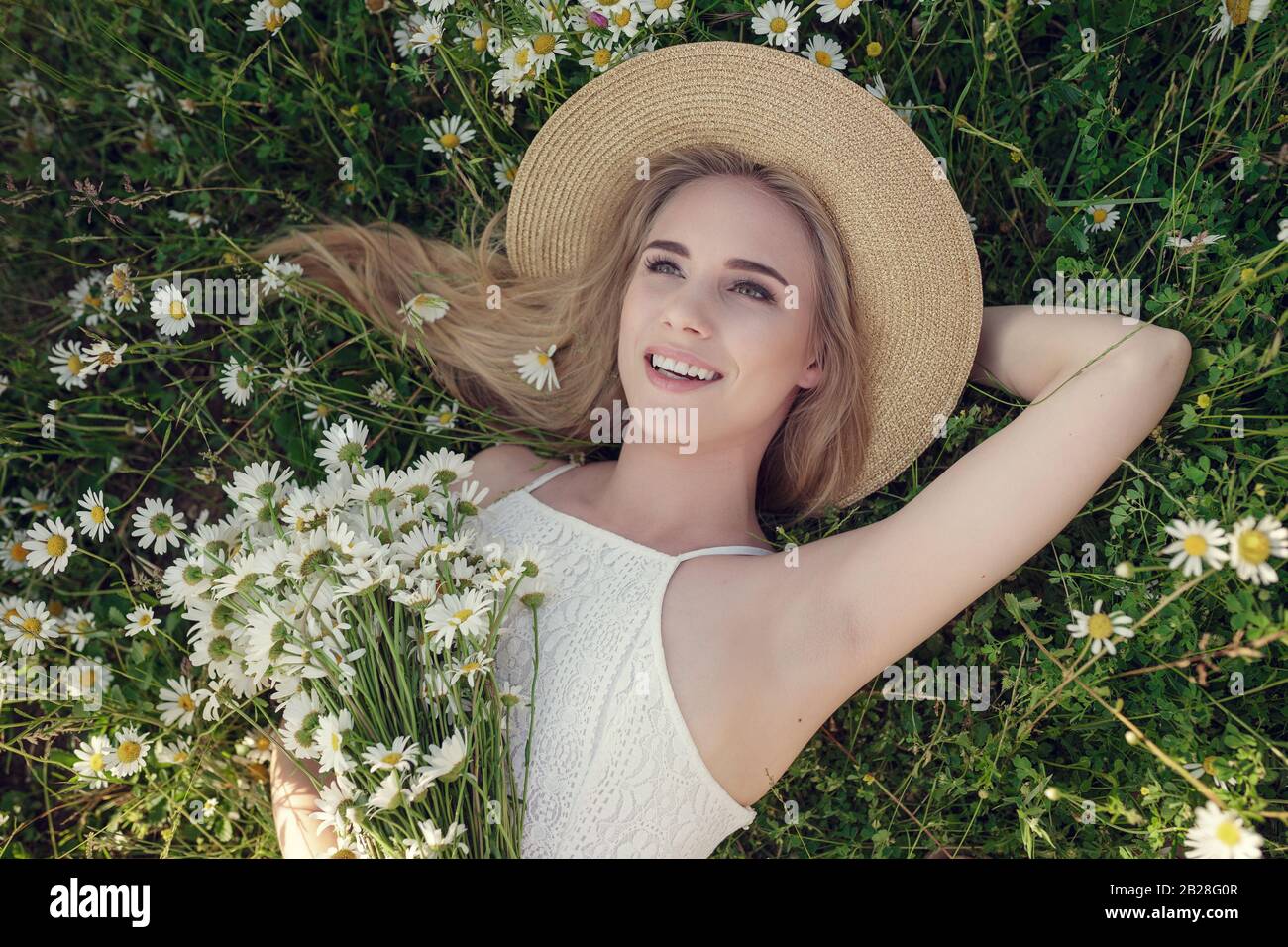 Beautiful Woman Enjoying Daisy Field Nice Female Lying Down In Meadow