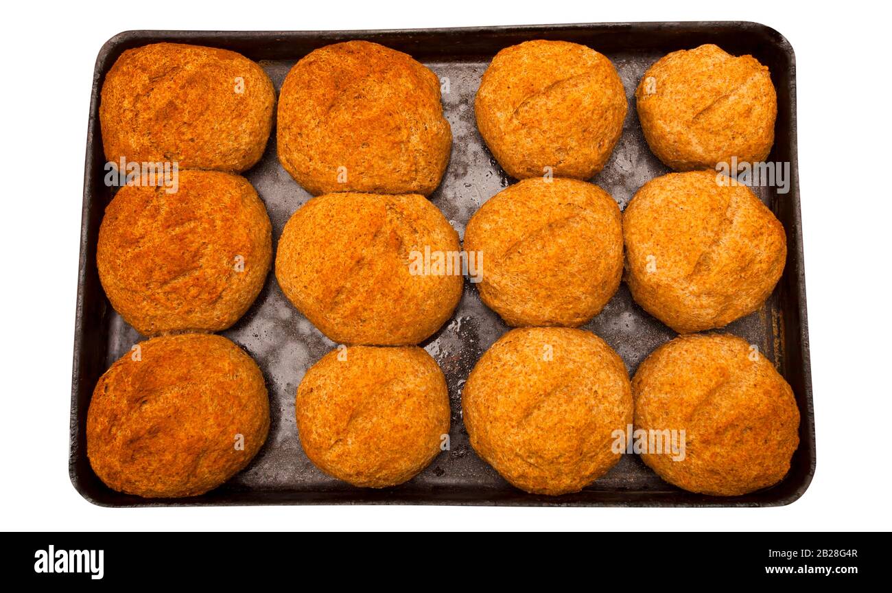 baked buns in a pan isolated on white Stock Photo - Alamy