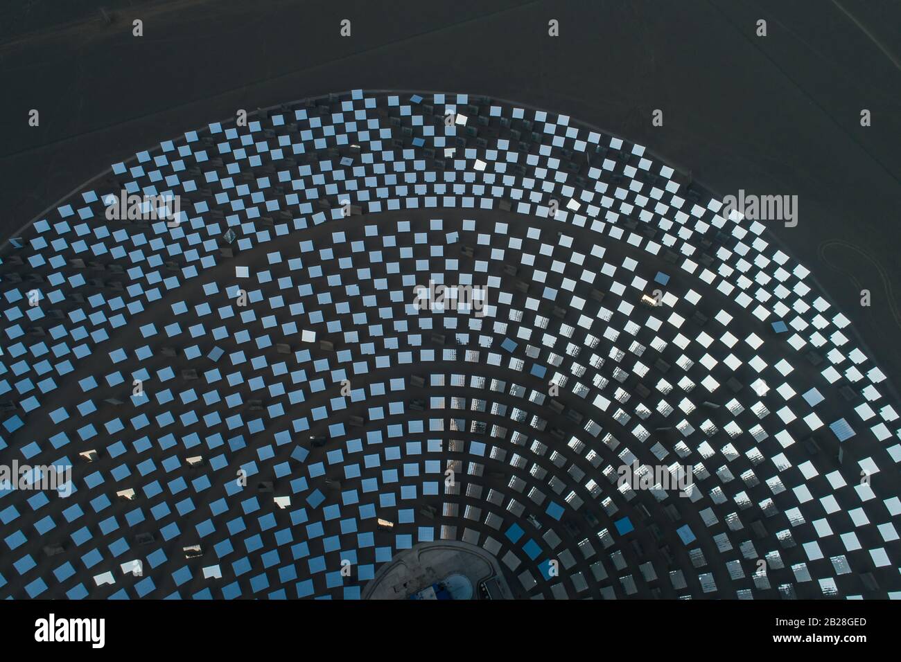 Aerial view of solar thermal plant uses mirrors that focus the sun's ...