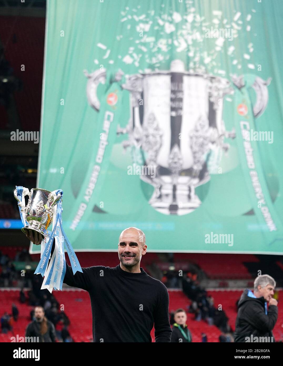 Manchester City manager Pep Guardiola the with trophy after the Carabao ...