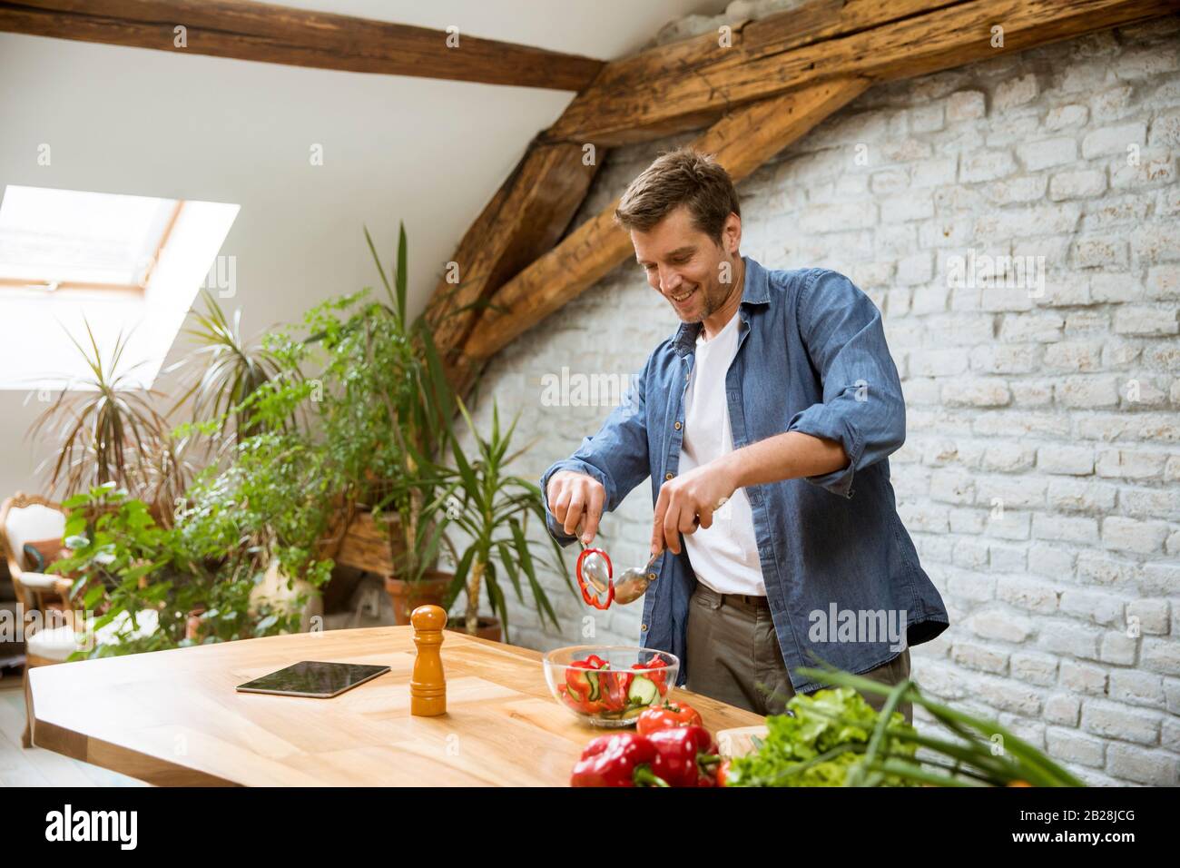 Preparing supper hi-res stock photography and images - Alamy