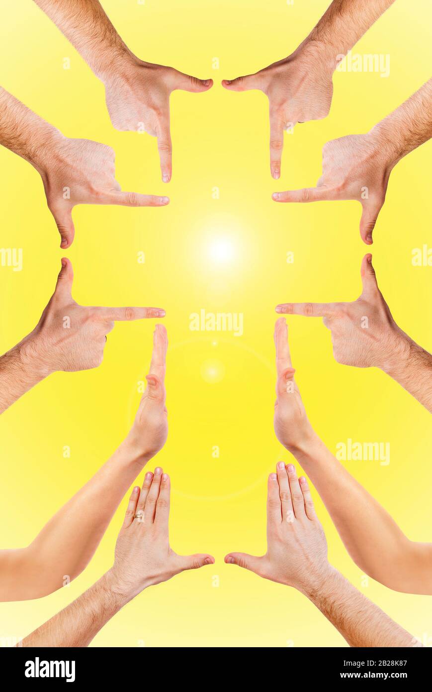 hands making cross symbol, religious sign on yellow sun light ...