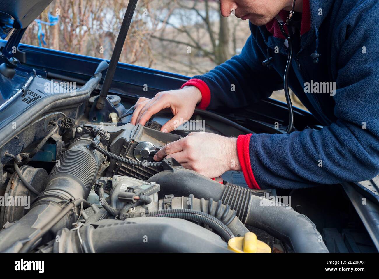 car engine check with stethoscope, abstract auto service concept Stock ...