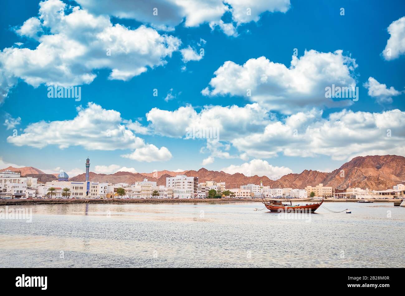 Muscat Coastline alongwith the mountains and blue sky. A traditional ...