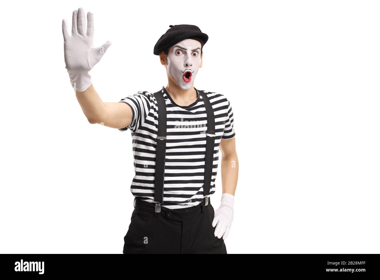Mime gesturing stop with hand isolated on white background Stock Photo ...