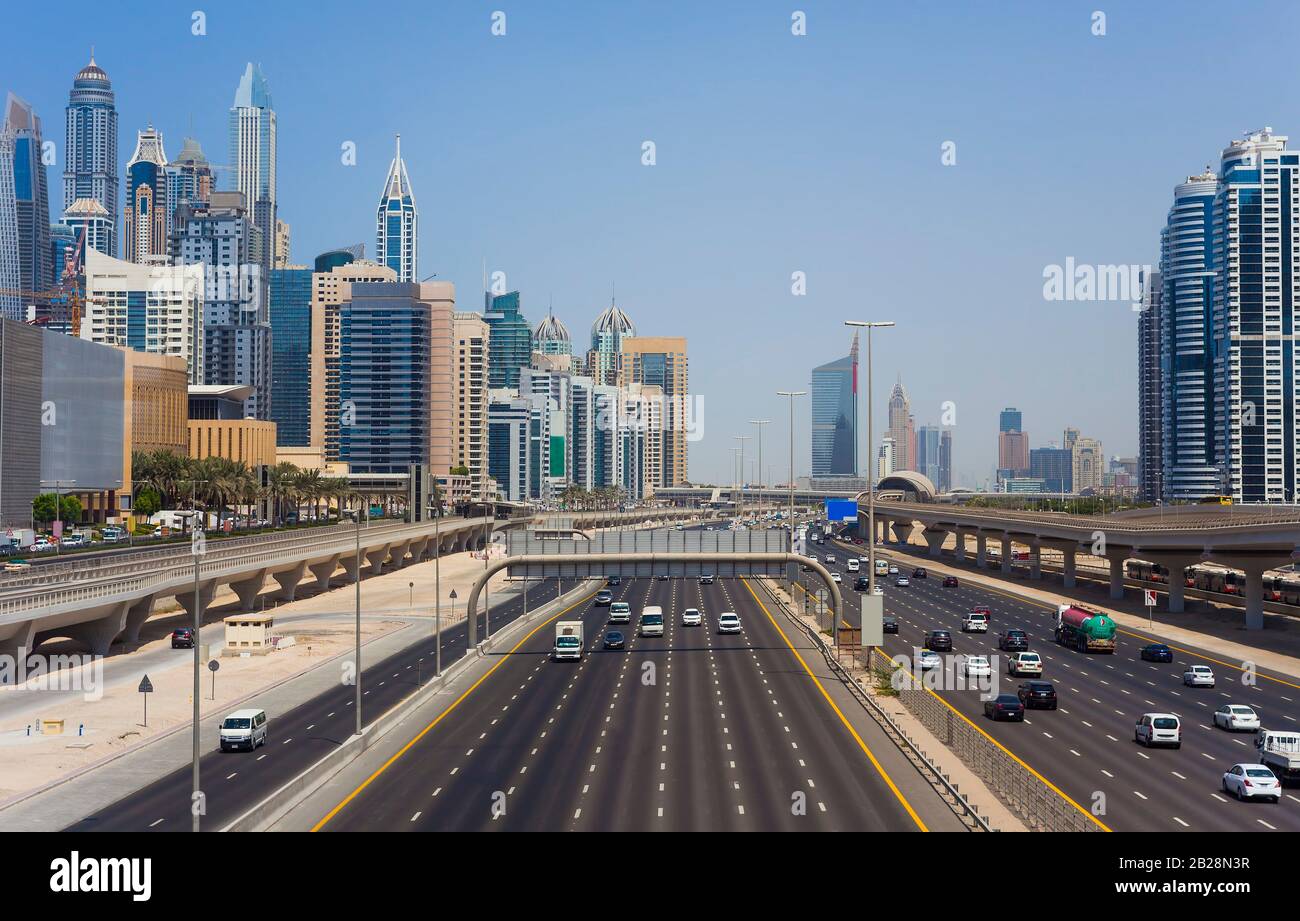 wide road in Dubai city skyline, United Arab Emirates Stock Photo - Alamy