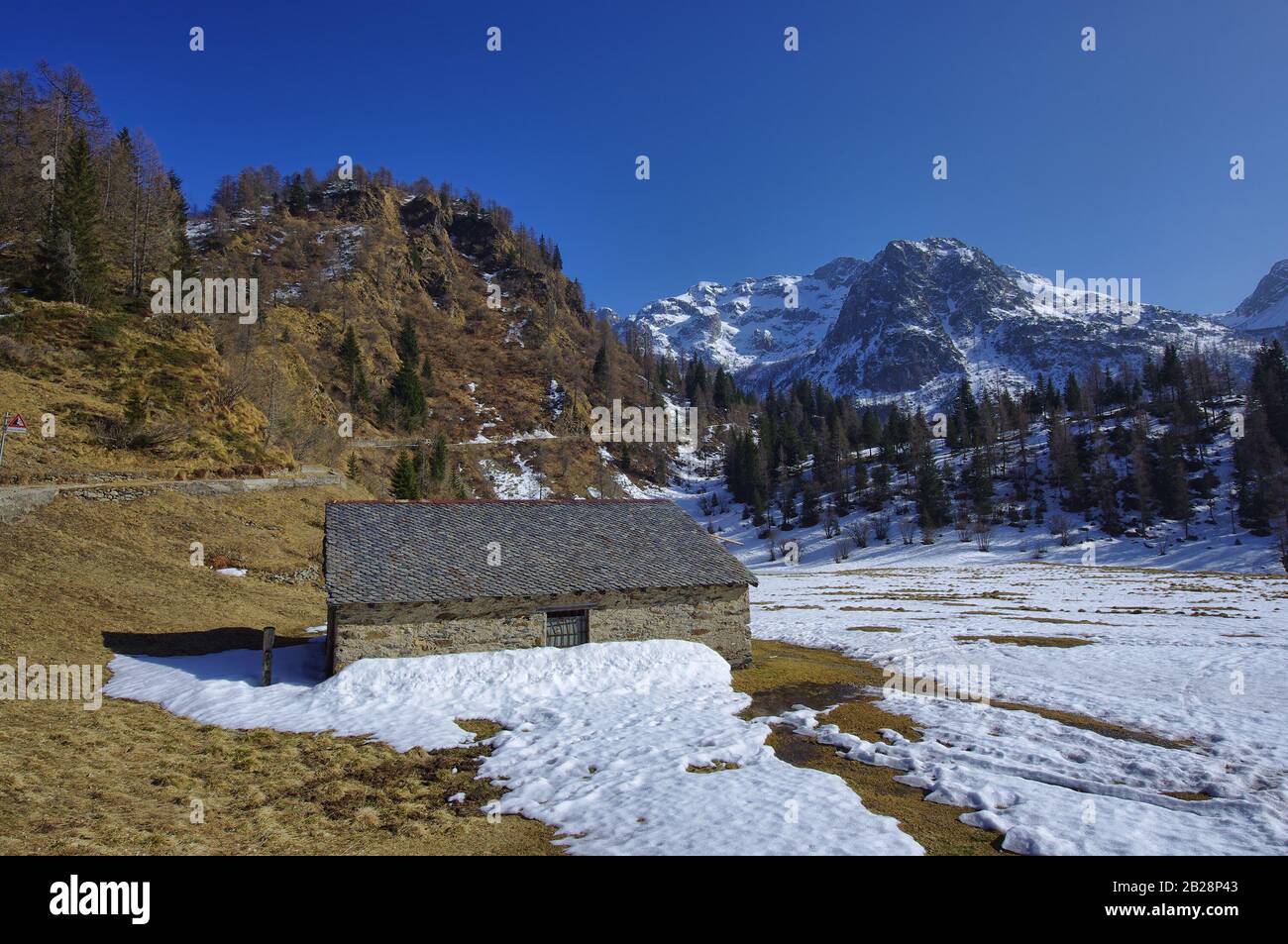 house with stone roof in Alps of Italy Stock Photo - Alamy