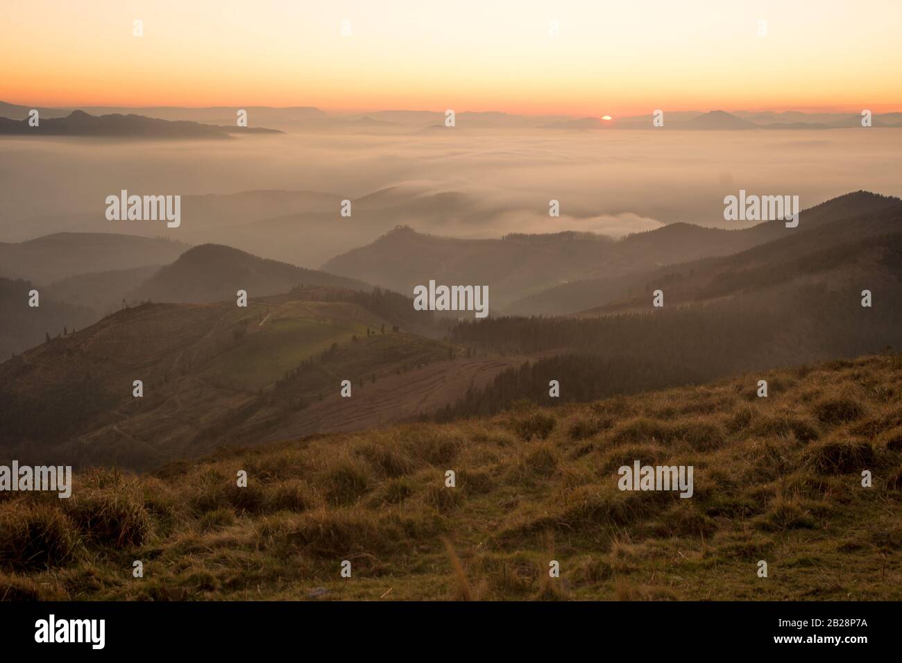 misty mountains in basque country (spain Stock Photo - Alamy