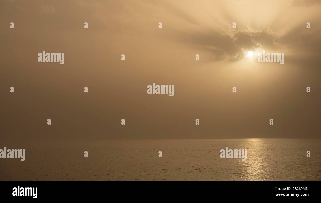 Sunset at Calima (sandstorm) on the Atlantic coast, La Palma, Canary ...