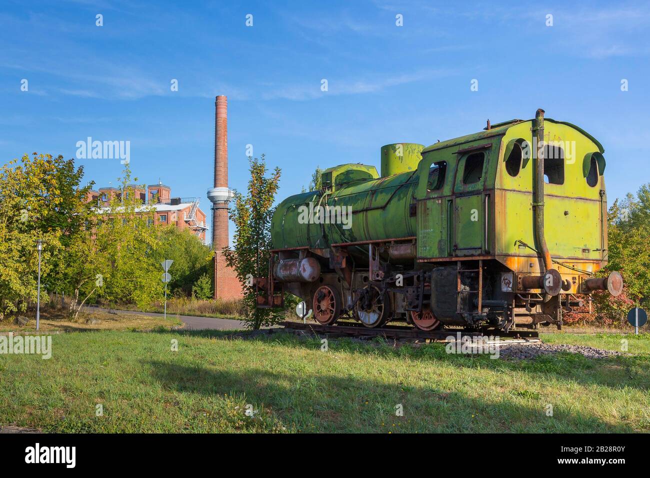 Old locomotive and factory buildings hi-res stock photography and ...