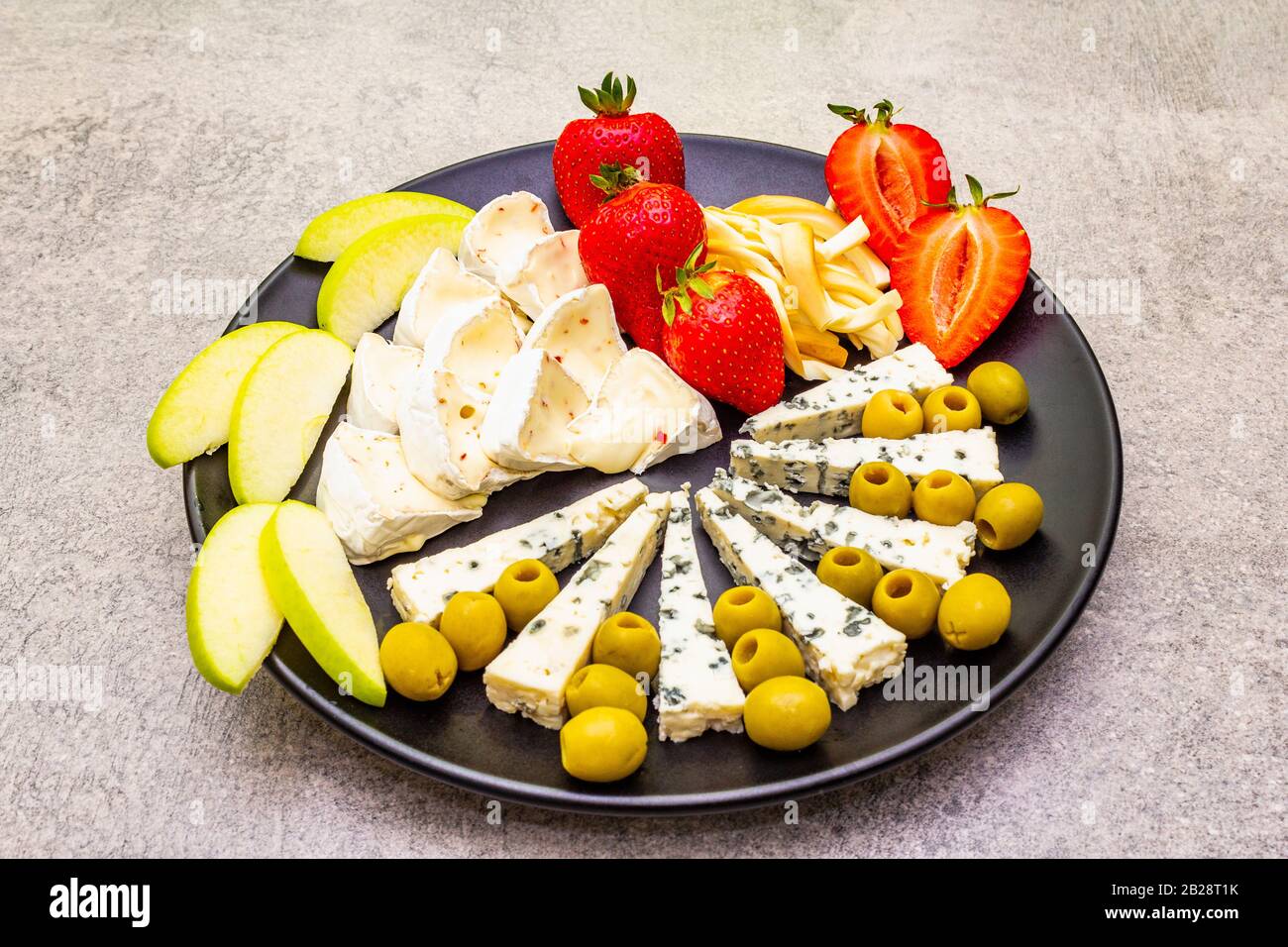 Delicious snack assorted cheeses plate. Bavarian cheese with jalapeno ...