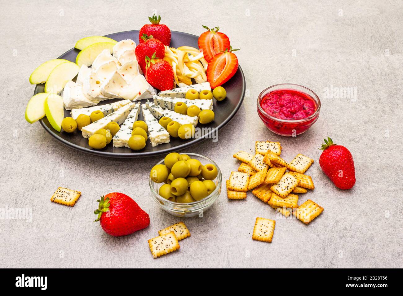 Delicious snack assorted cheeses plate. Bavarian cheese with jalapeno ...