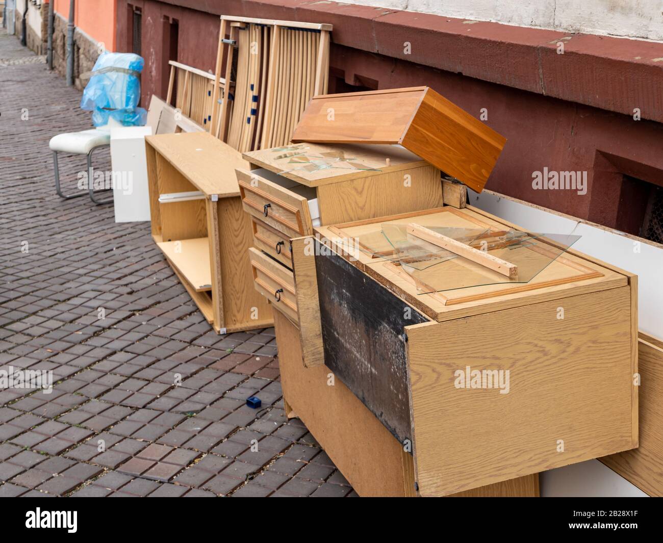 Household waste disposal on the roadside Stock Photo - Alamy