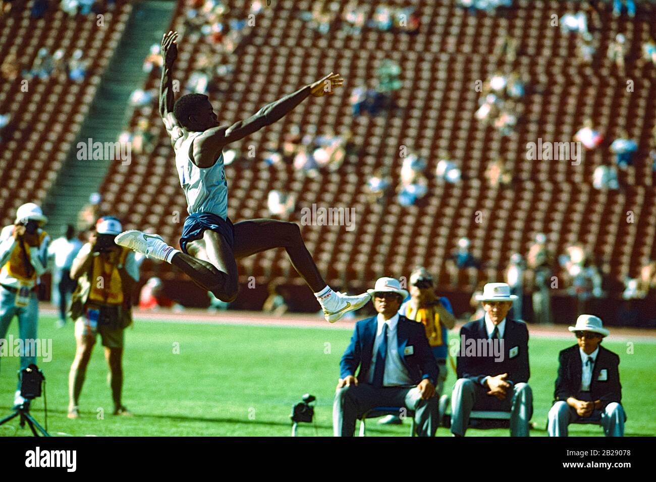 Carl Lewis competing the long jump at the 1984 US Olympic Track and ...