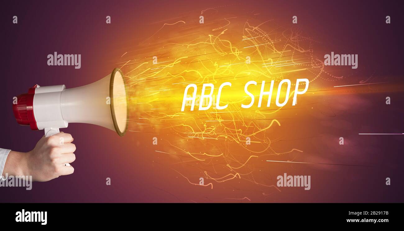 Young girld shouting in megaphone with ABC SHOP inscription, online ...