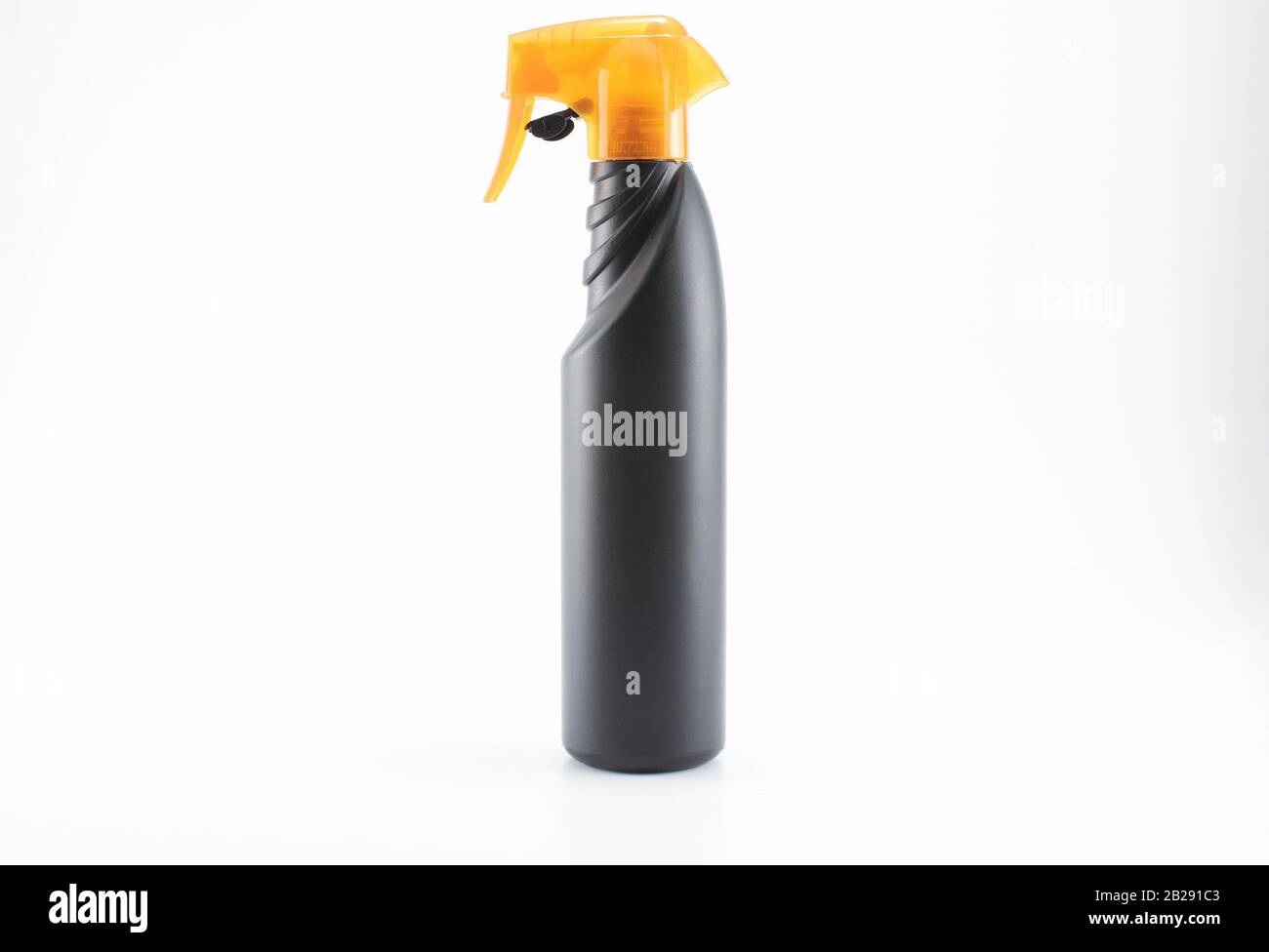 Plastic black and orange insecticide bottle. It is used by pressing the ...