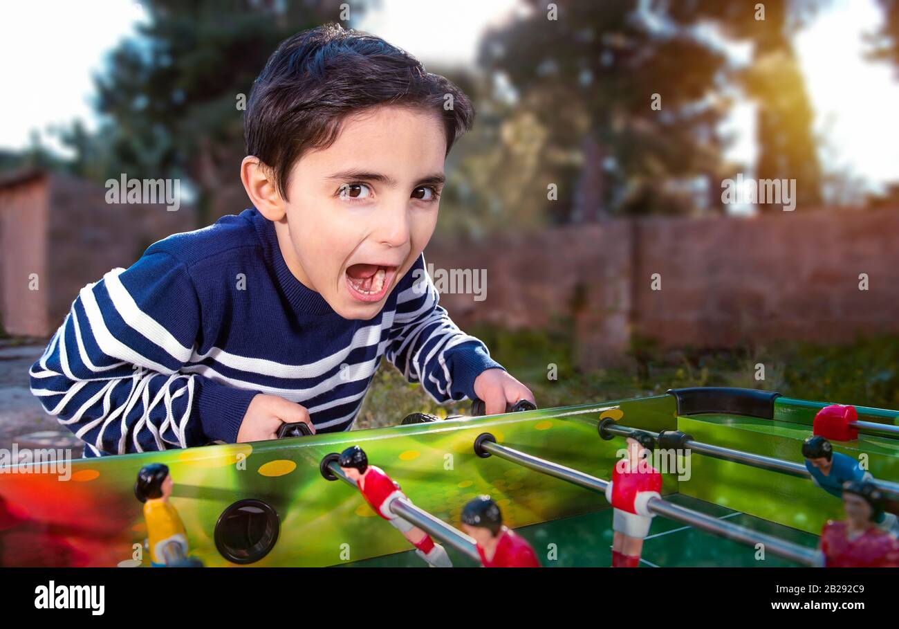 Child scoring goal hi-res stock photography and images - Alamy