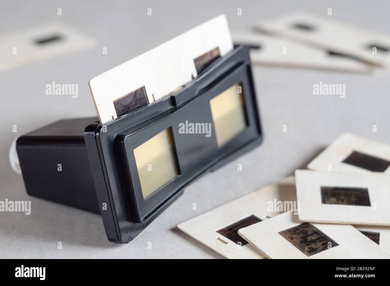 Old plastic stereoscope with a stereo card. Outdated 3D viewing device ...