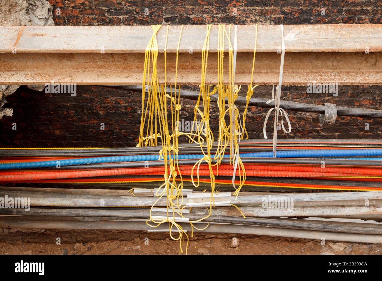 Cables Hung by Rope and Twine on Steel I-Beam Stock Photo - Alamy