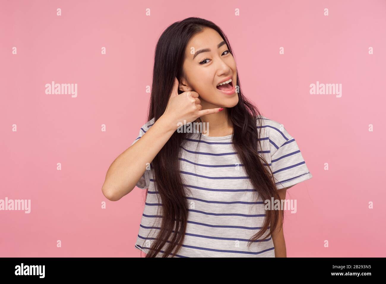 Let's communicate! Portrait of happy cute girl with long brunette hair ...