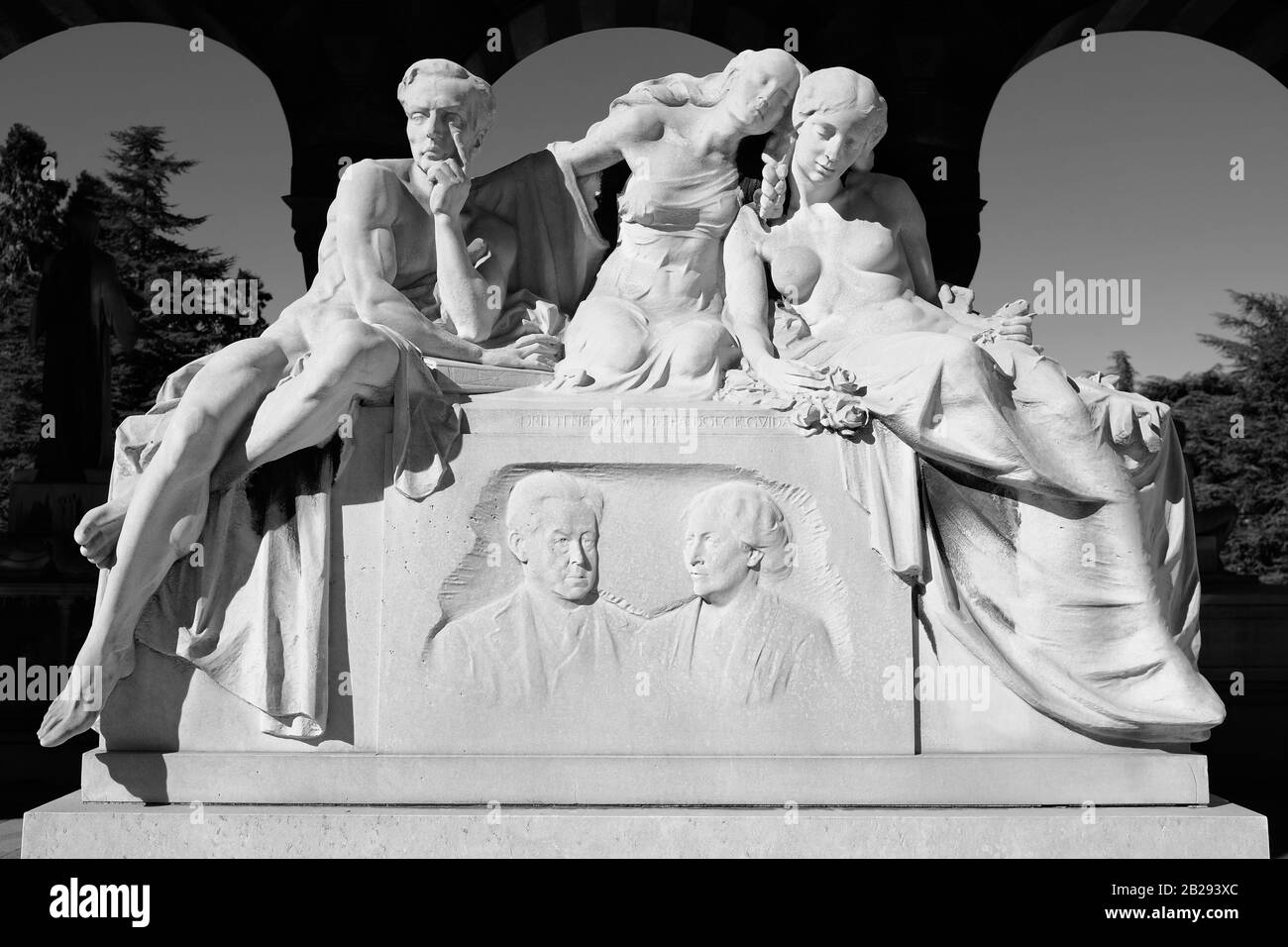 Marble statue adorning a grave at the Monumental Cemetery in Milan ...