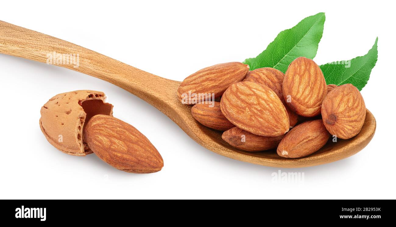 Almonds nuts in wooden spoon isolated on white background with clipping ...
