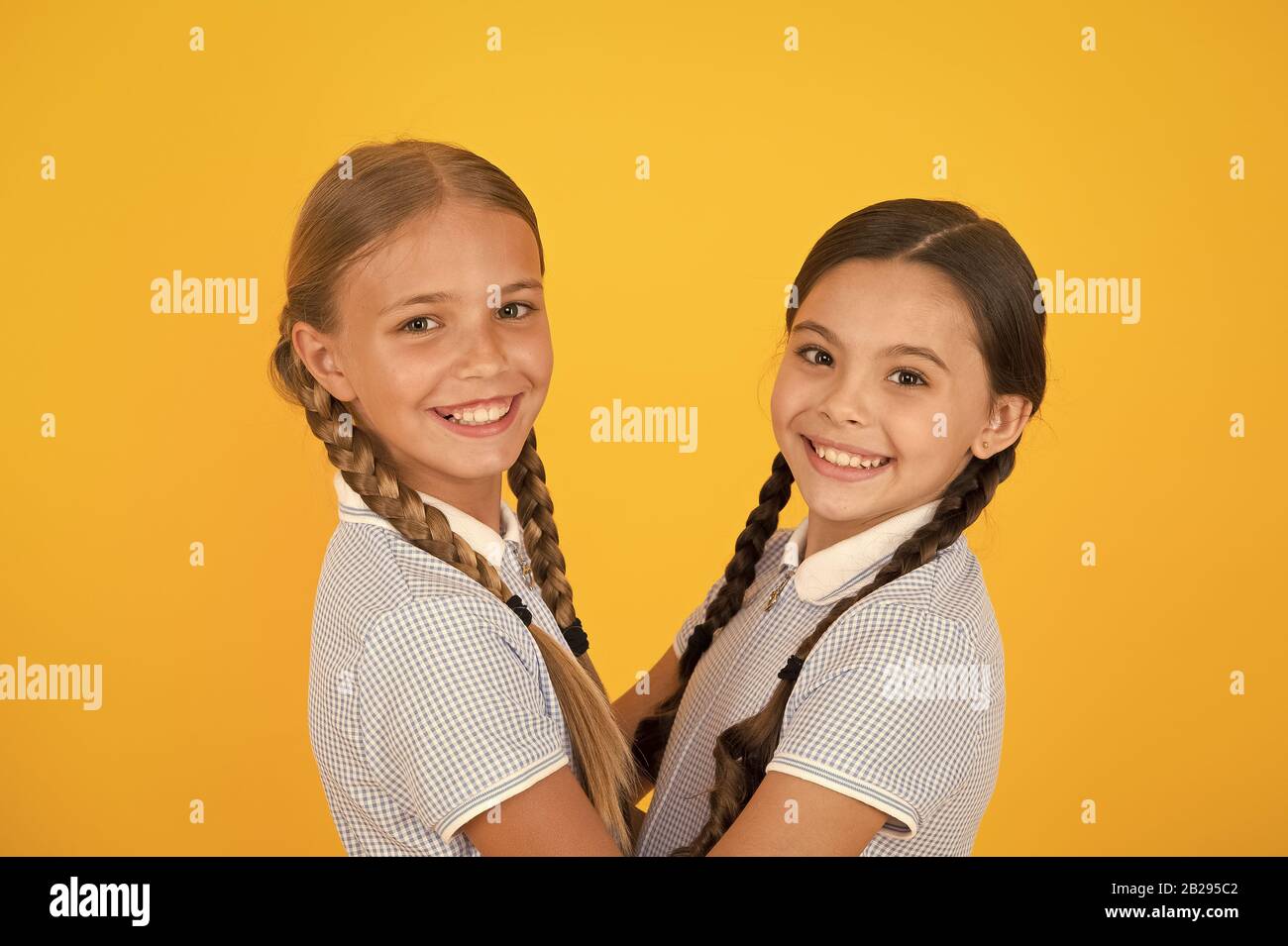 happy friends on yellow background. fashion beauty. childhood happiness ...