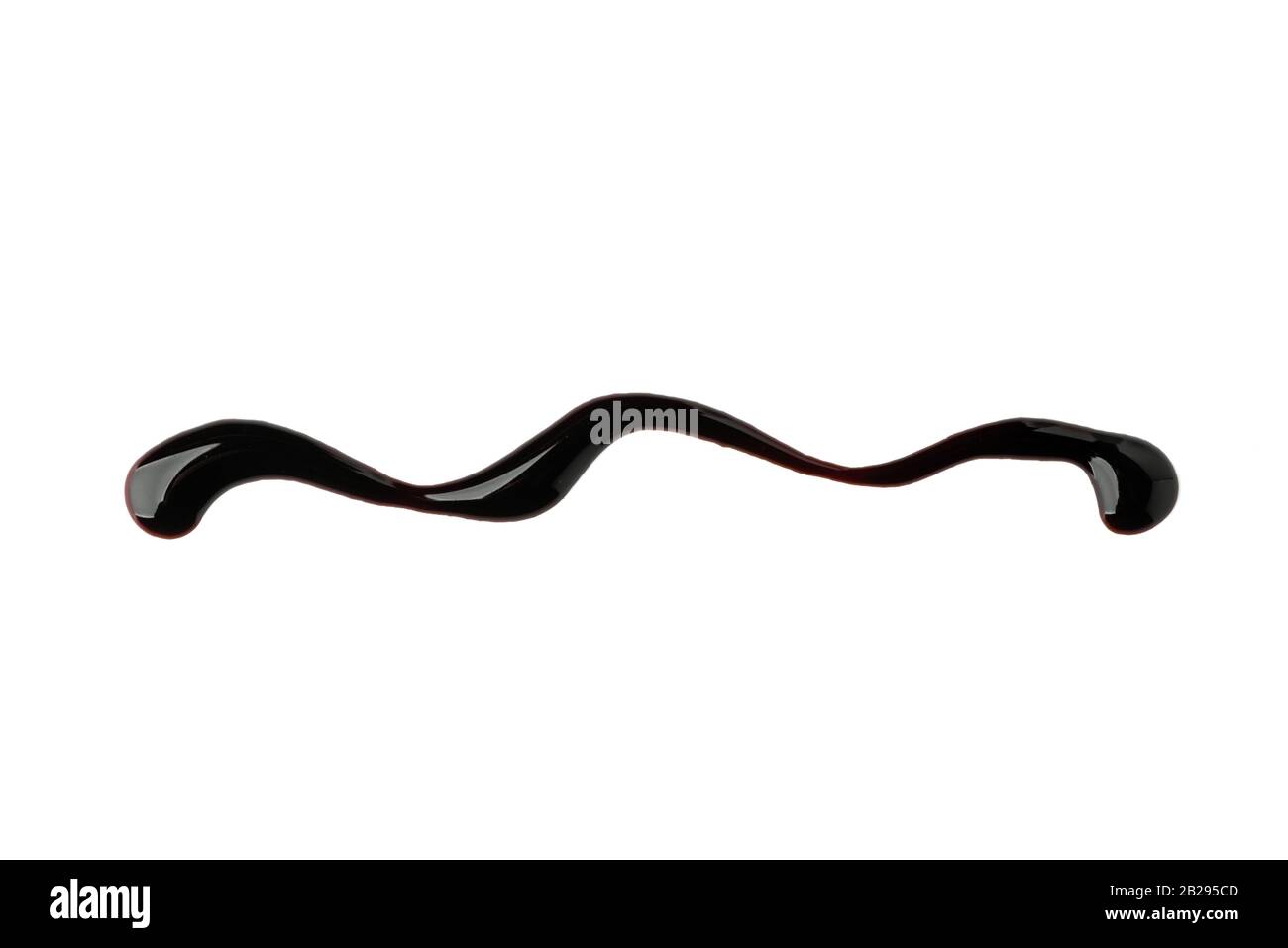 Wavy line painted with chocolate syrup on white background Stock Photo ...