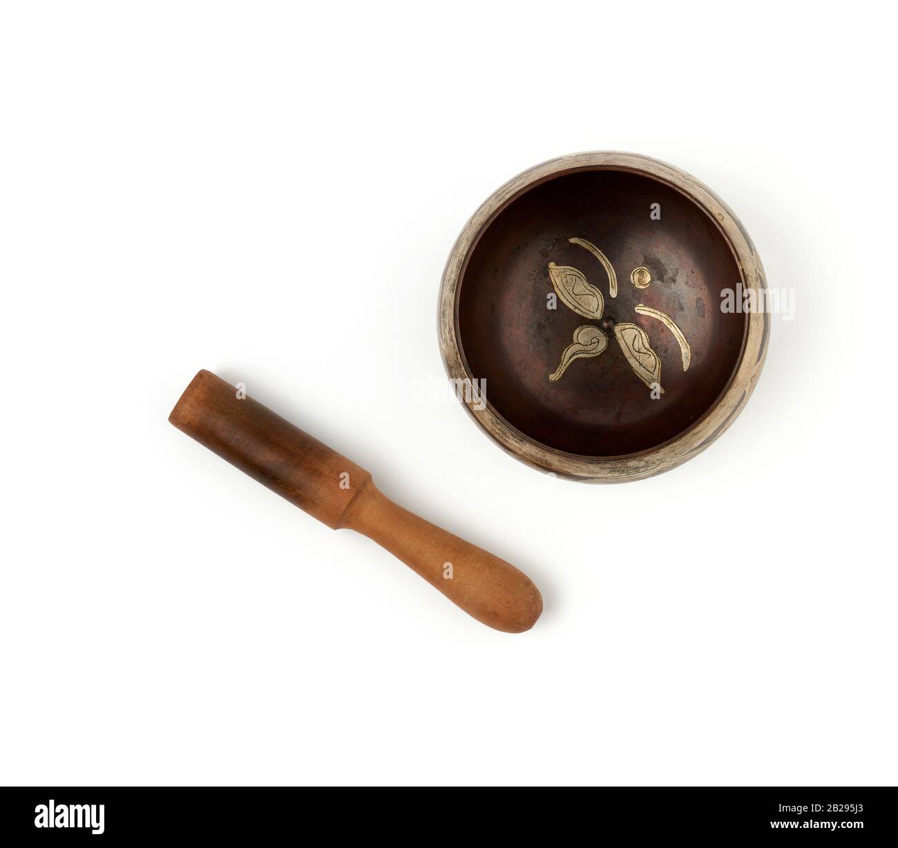 copper singing bowl and wooden stick isolated on white background, top ...