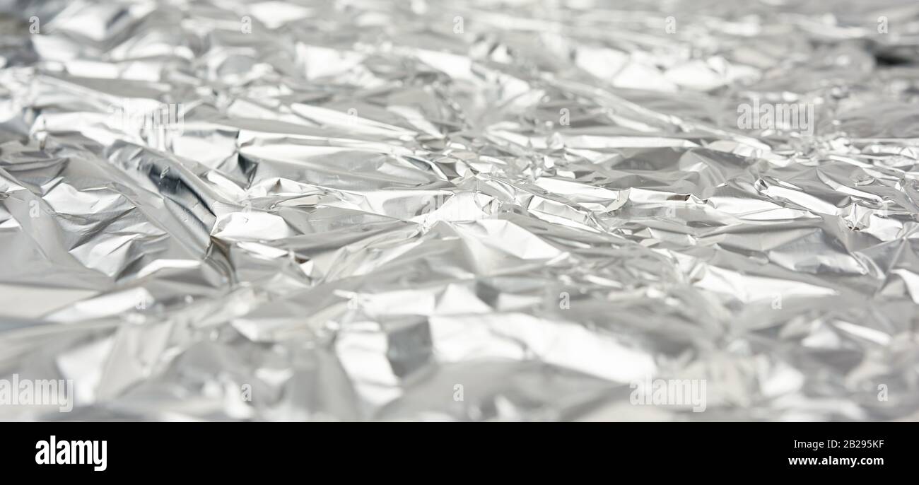 texture of frosted crumpled piece of foil, packaging material for food ...