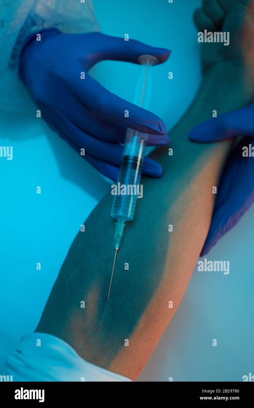 Plastic surgery blood syringe hi-res stock photography and images - Alamy