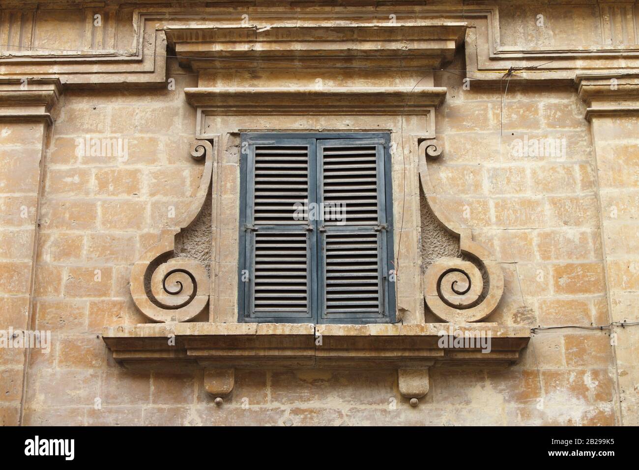 Typical limestone window in Malta Stock Photo - Alamy