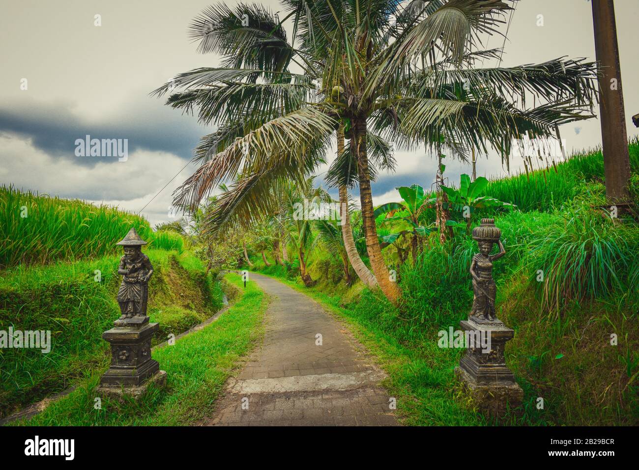 Monuments on entrance to balinese rice field and farm near Jatiluwih ...