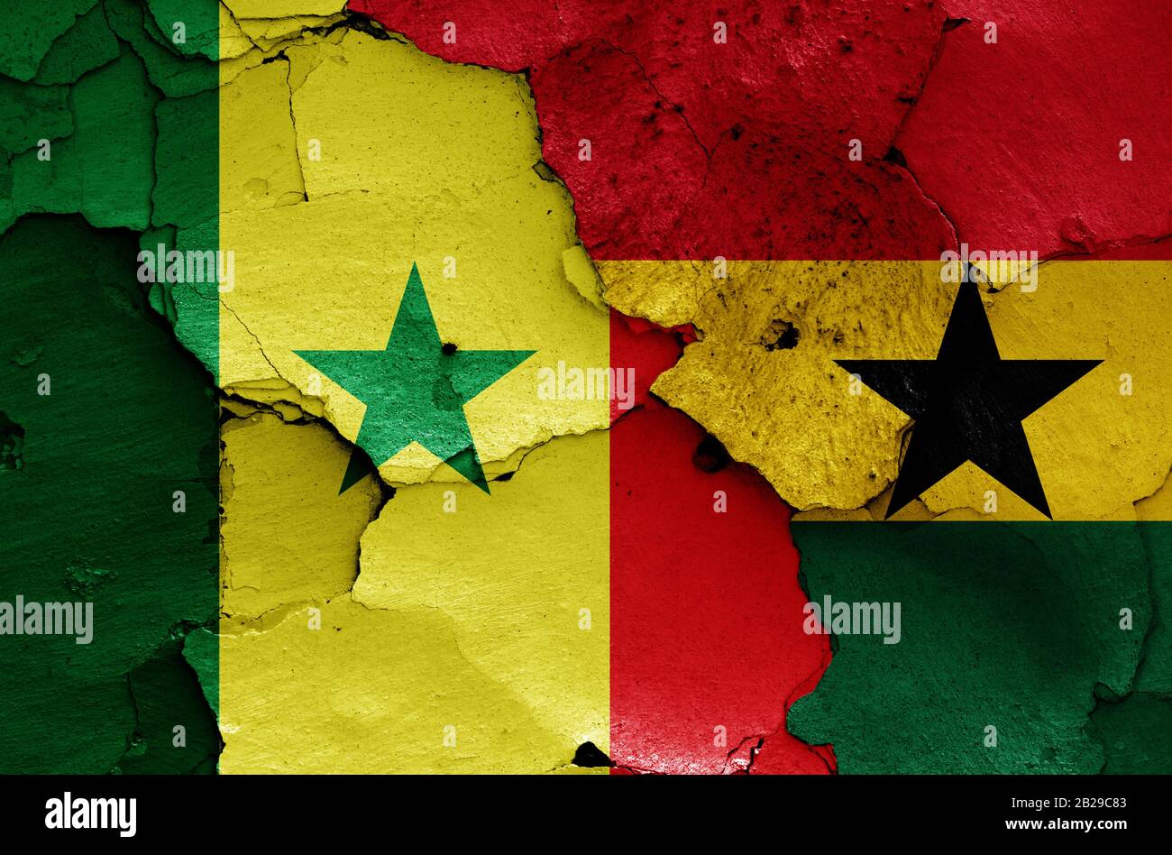 flags of Senegal and Ghana painted on cracked wall Stock Photo - Alamy