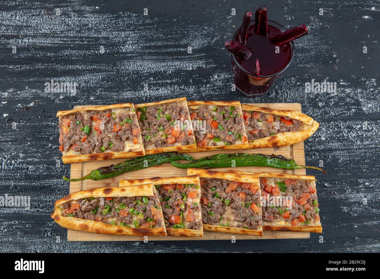 Traditional Turkish dish pita beef - Kusbasili Pide. Turkish Pide with ...