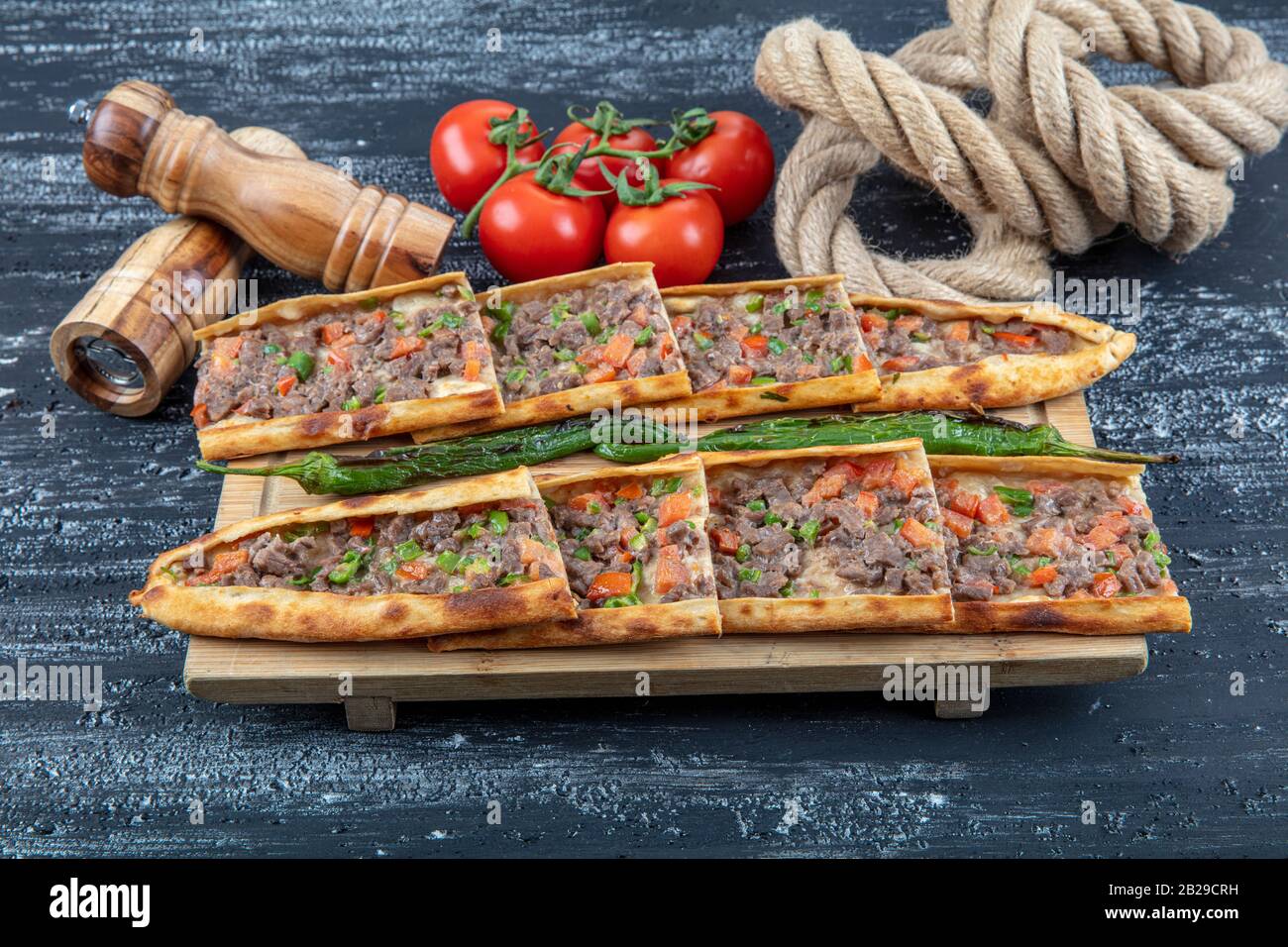 Traditional Turkish dish pita beef - Kusbasili Pide. Turkish Pide with ...