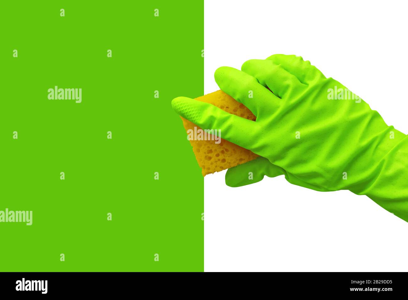 Human hand with green rubber gloves holding yellow sponge. Concept of ...