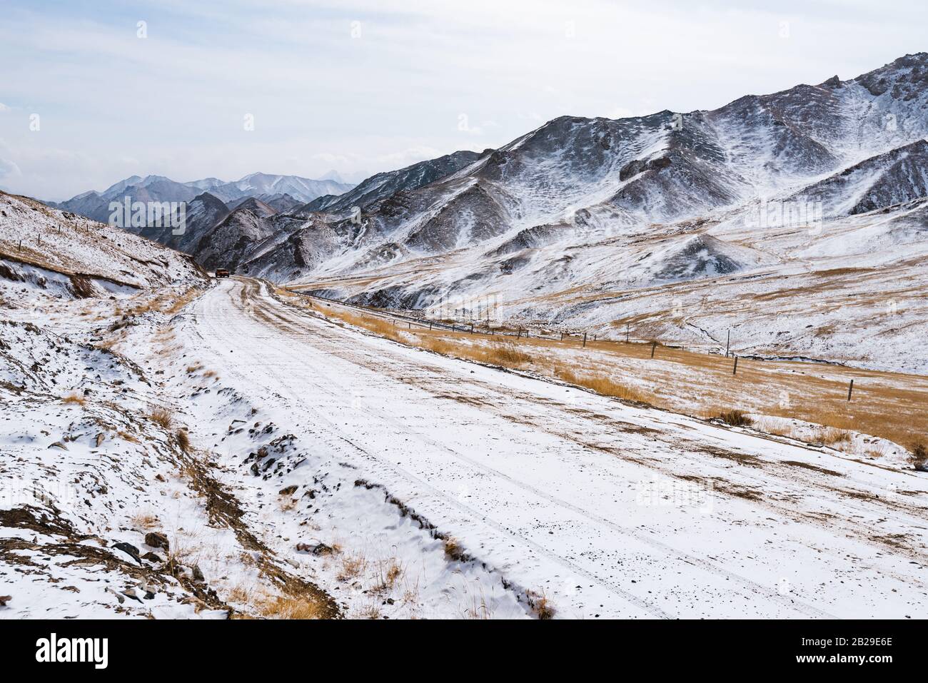 the gravel road on the snow mountain Stock Photo - Alamy