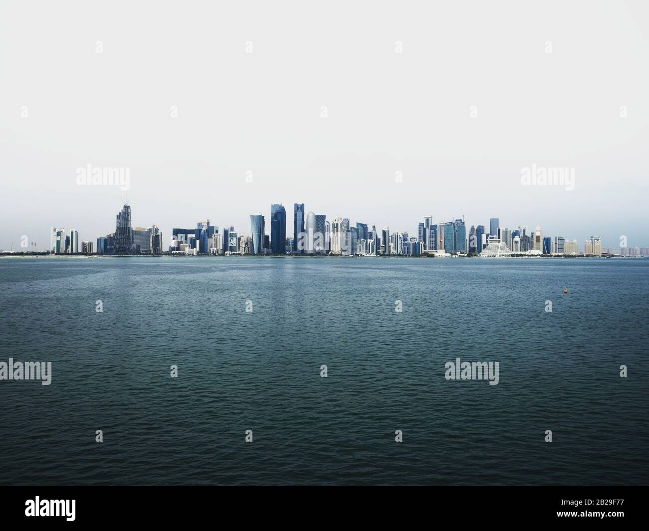 Doha skyline seen from the Dhow Harbour in Qatar Stock Photo - Alamy