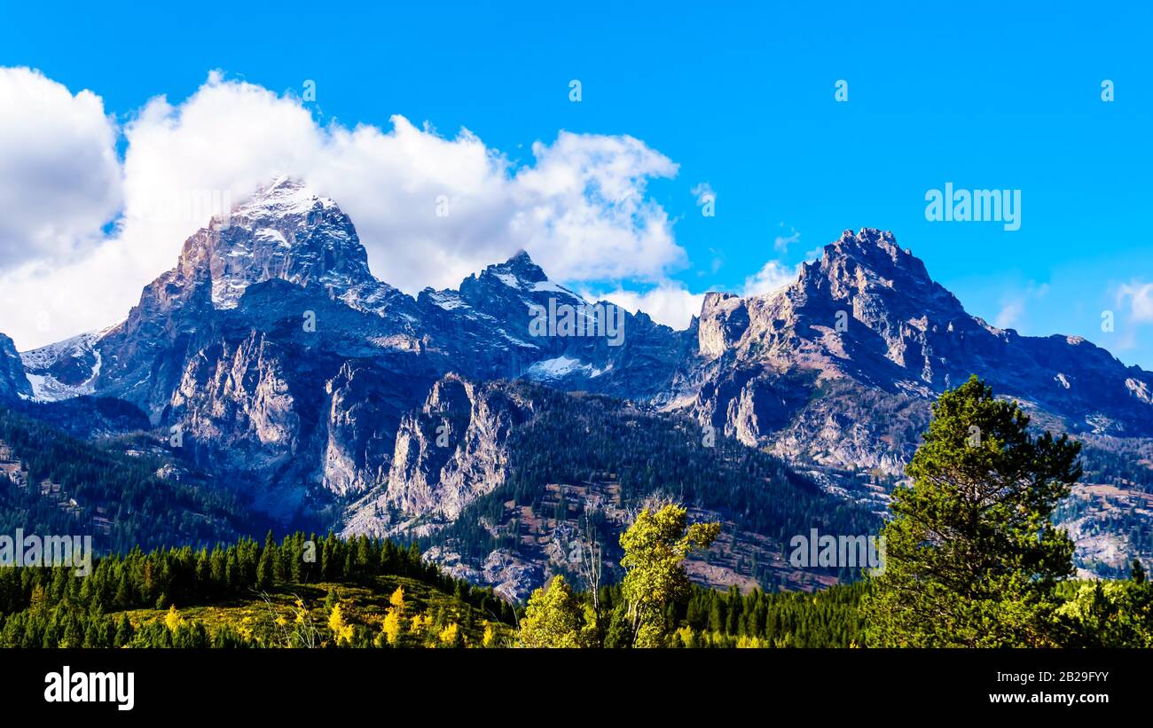 The tall mountain peaks of Grand Teton, Mount Owen and Teewinot ...