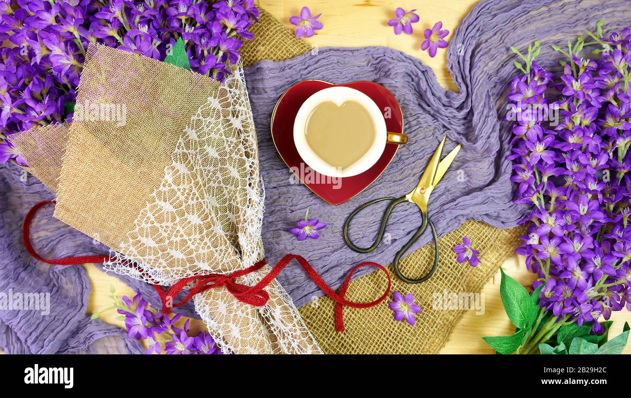 Springtime creative composition layout with purple lilac style orchids ...
