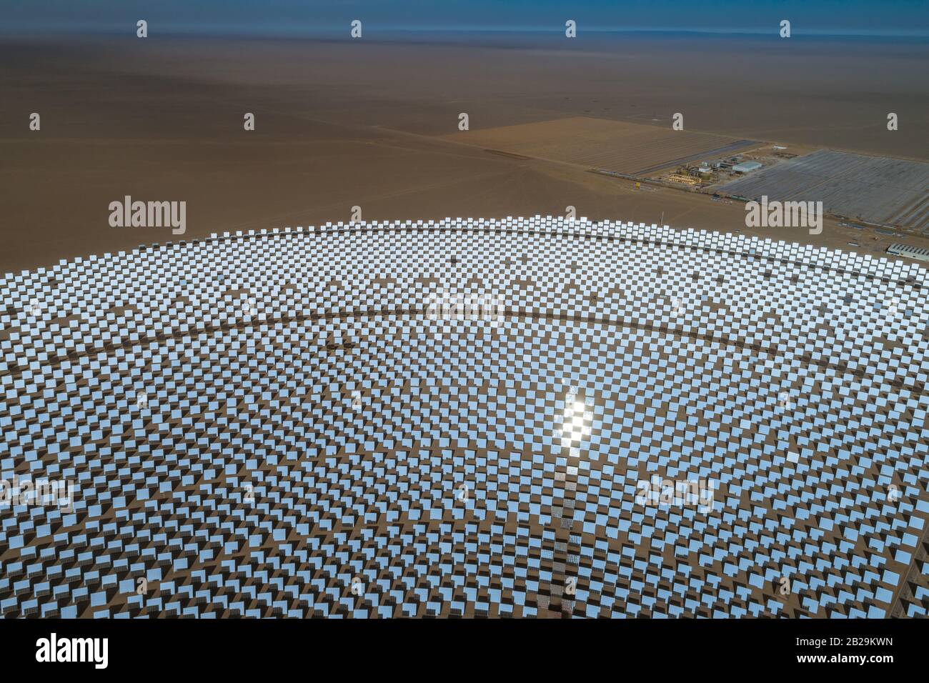Aerial view of solar thermal plant uses mirrors that focus the sun's ...