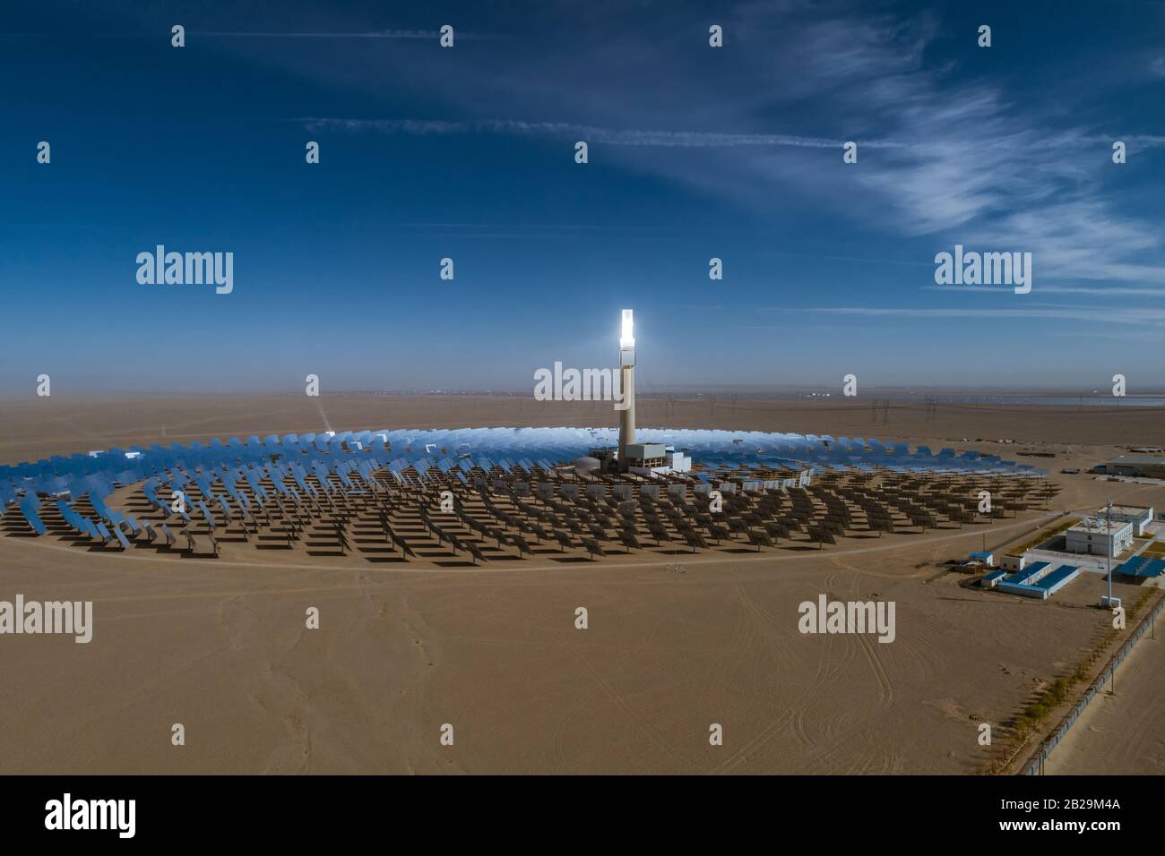 Aerial view of solar thermal plant uses mirrors that focus the sun's ...