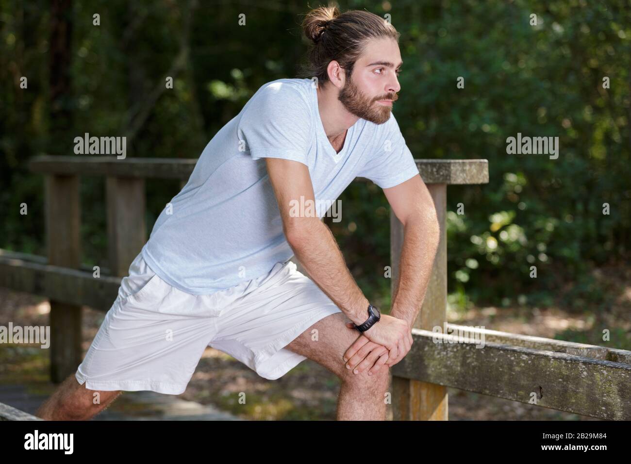 picture of man stretching knee Stock Photo - Alamy