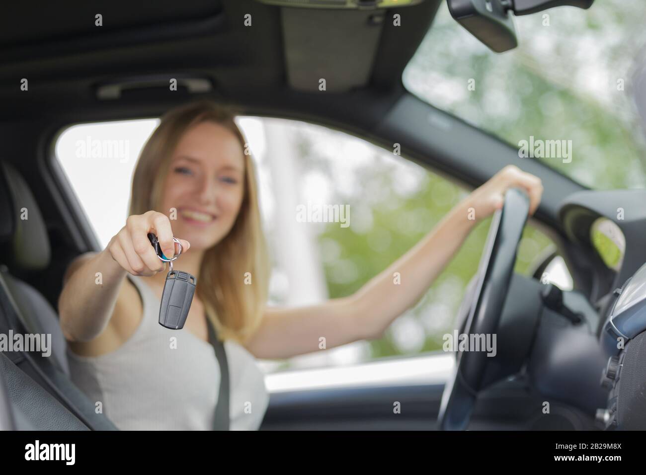 Woman keys standing outside hi-res stock photography and images - Alamy