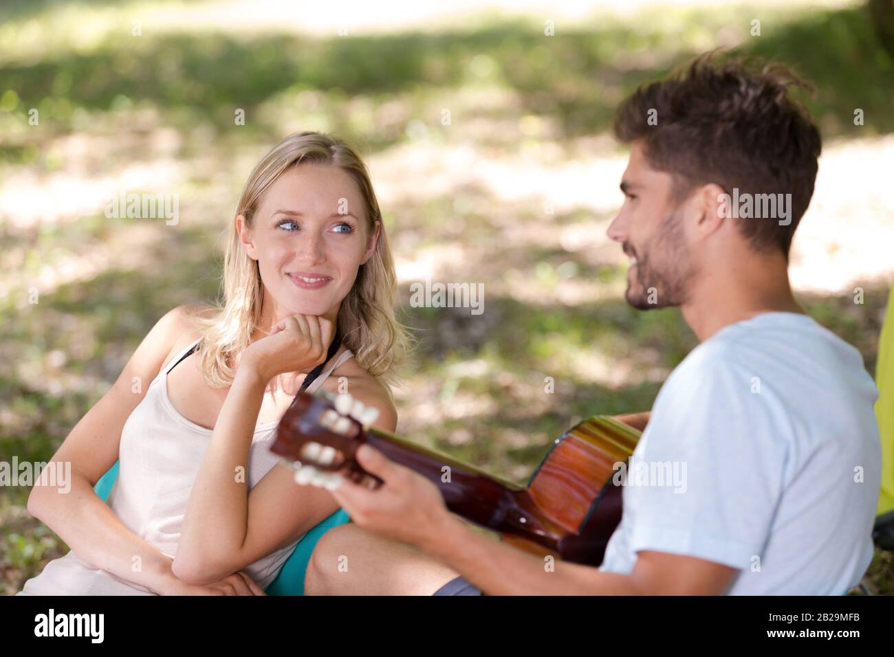 Young lovers under hi-res stock photography and images - Alamy