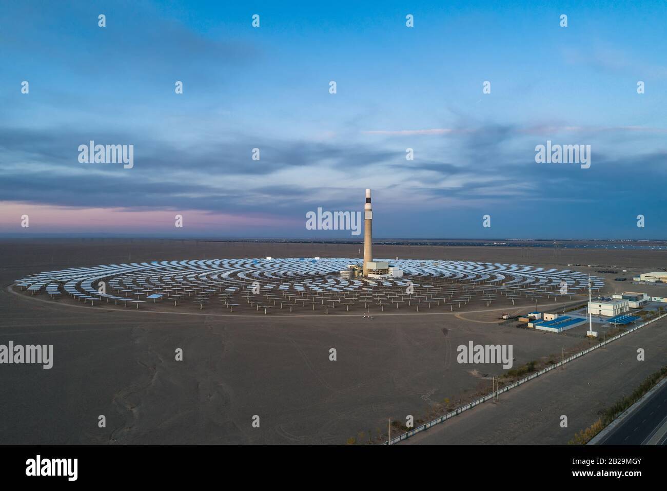 Aerial view of solar thermal plant uses mirrors that focus the sun's ...