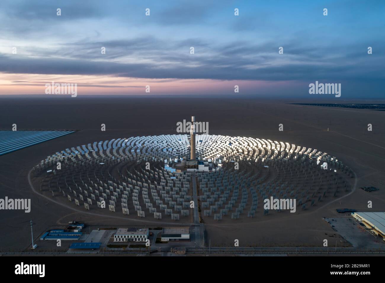 Aerial view of solar thermal plant uses mirrors that focus the sun's ...
