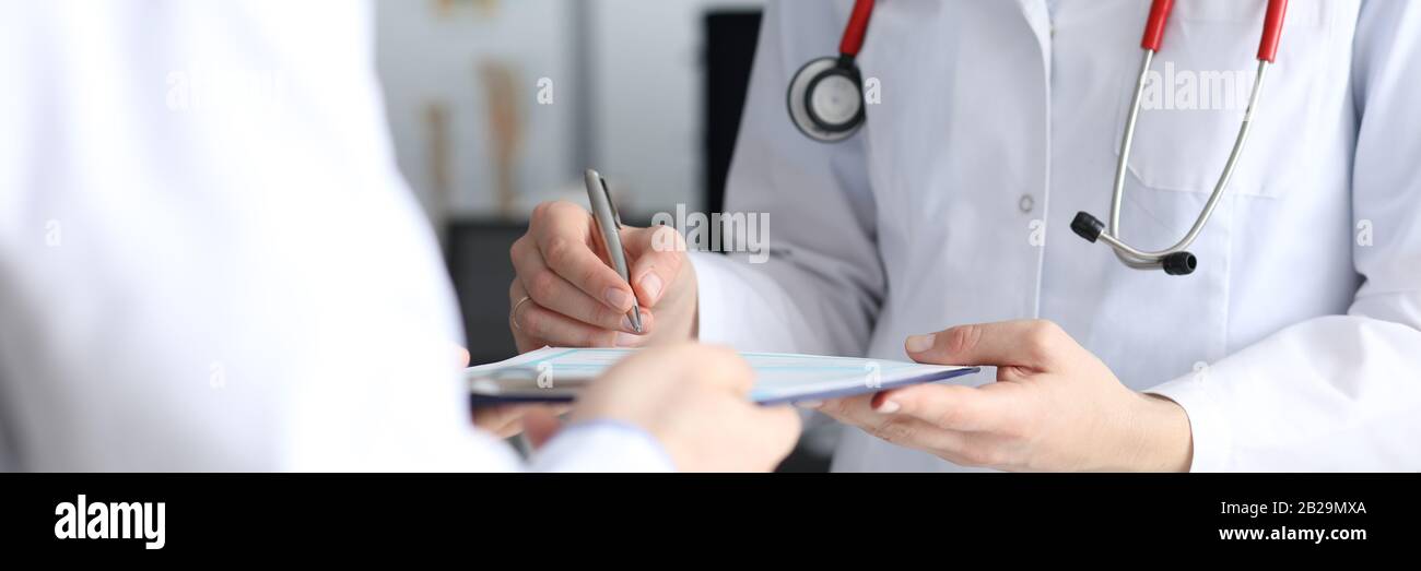 Female doctor in clinic Stock Photo - Alamy