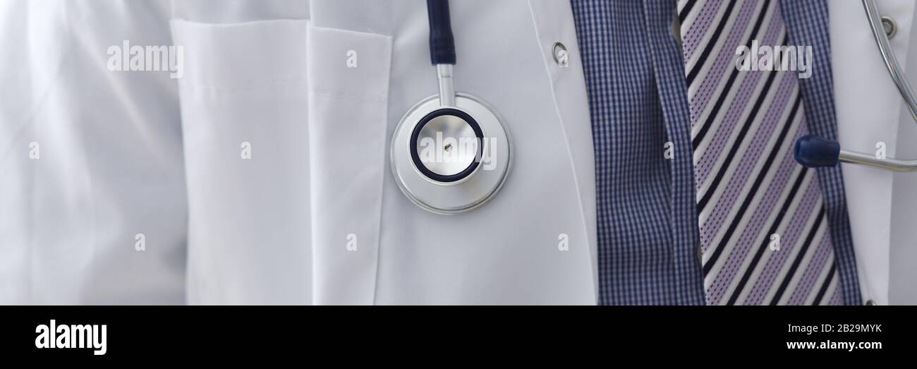 Doctor in medical gown Stock Photo - Alamy